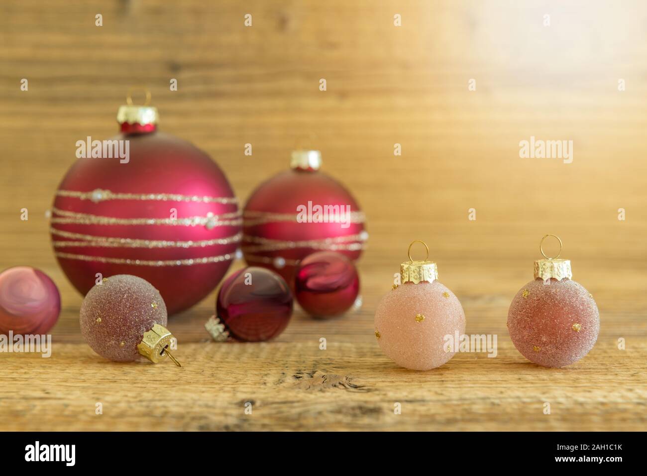 Red Christmas balls in different sizes for decorating Stock Photo - Alamy