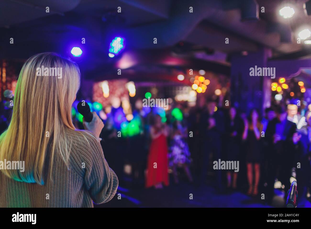 Lady speaking on stage hi-res stock photography and images - Alamy