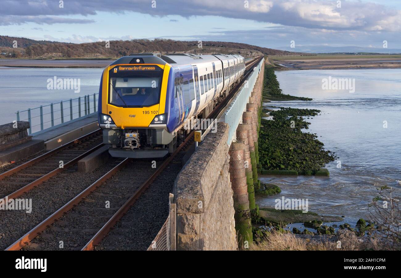 Northern rail CAF class 195 train 195107 crossing Levens viaduct (river ...