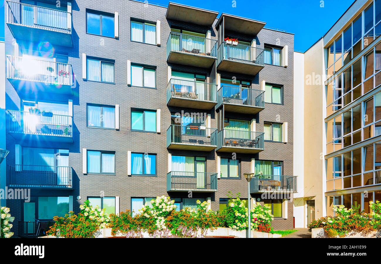Modern apartment residential buildings with flowerpot reflex Stock ...