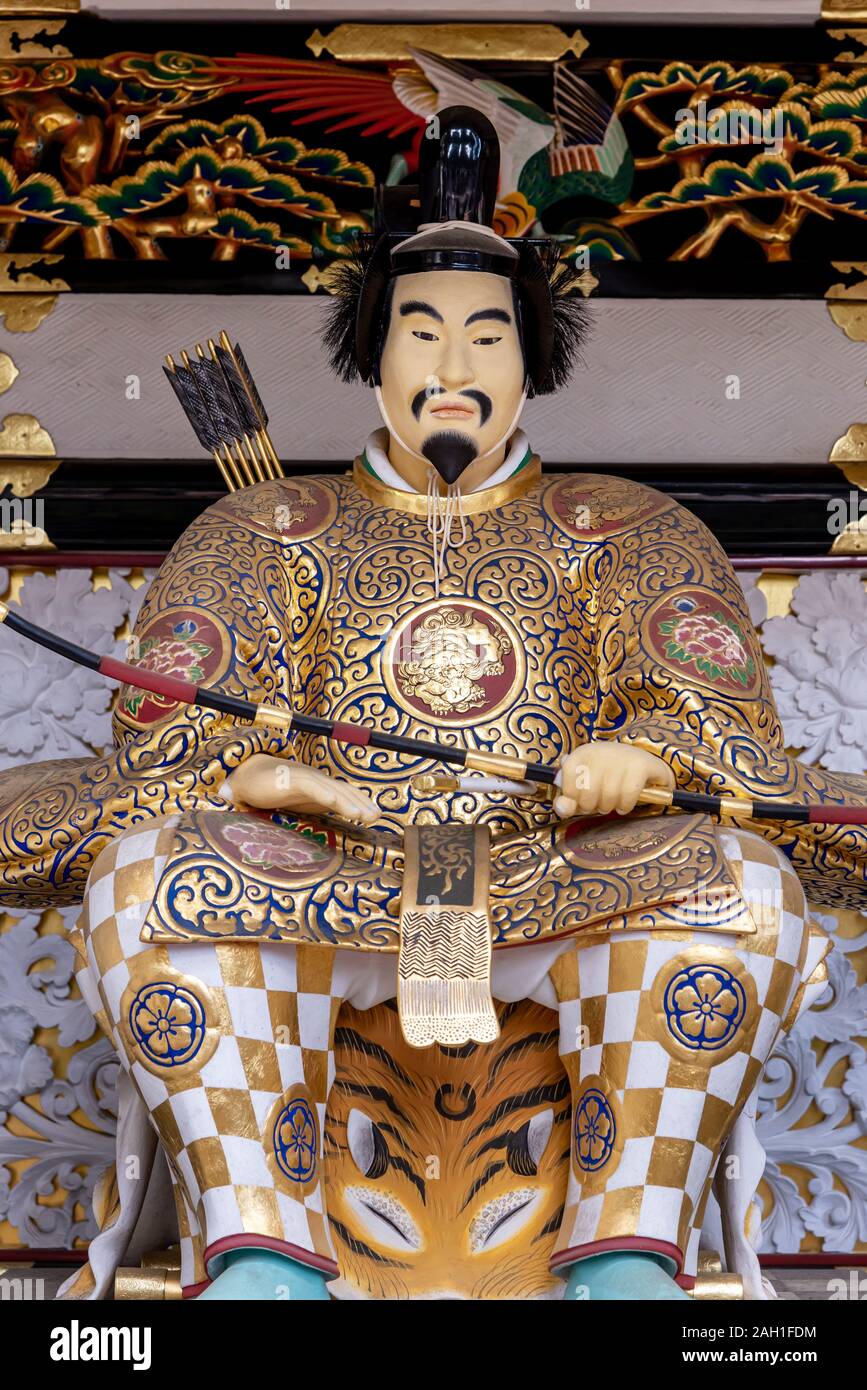 A wooden carving of Ieyasu (Zuijin Guardian Statue) with a bow at ...