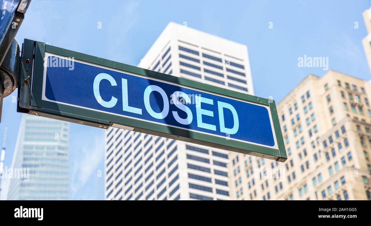 Closed street sign, blue color road sign, text closed. Highrise ...