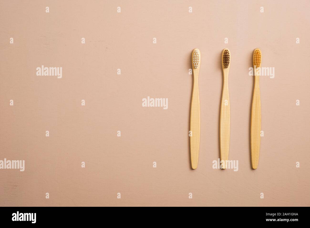 Top view eco natural bamboo toothbrushes on beige background. Zero ...