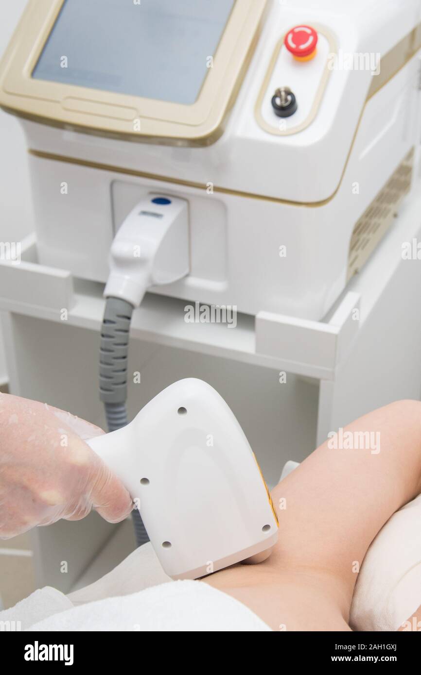 Laser epilation of armpits Stock Photo - Alamy