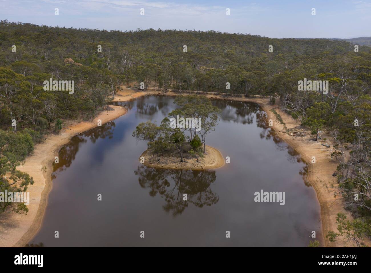 Aerial photograph of a drought affected water reservoir and mini island ...