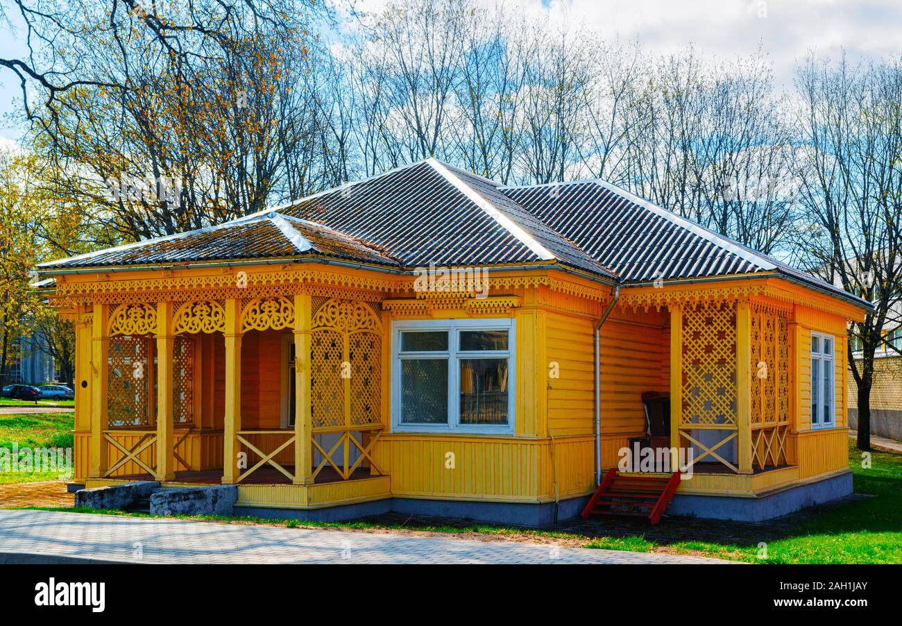 Small wooden country house with terrace Vilnius reflex Stock Photo - Alamy