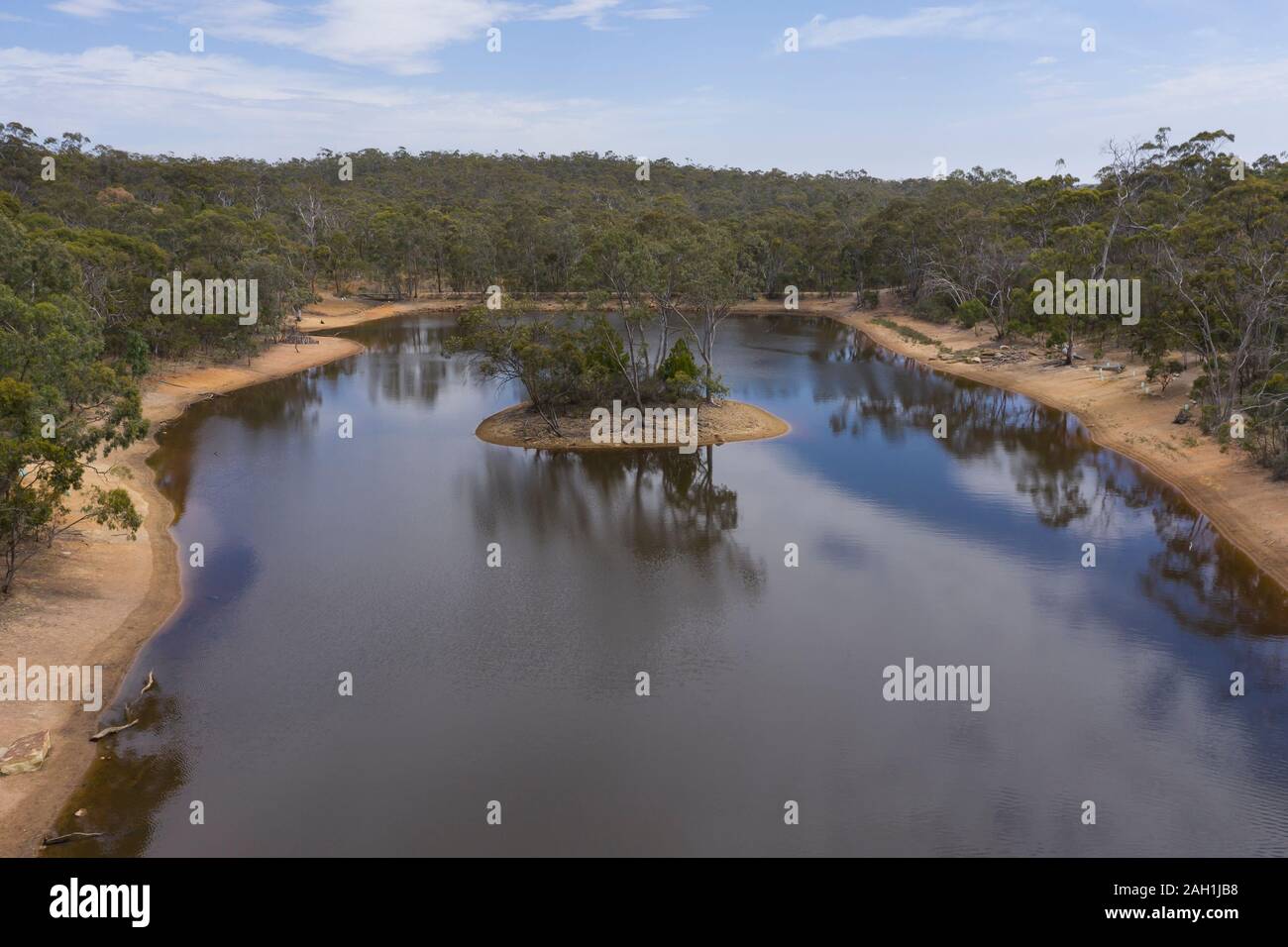Aerial photograph of a drought affected water reservoir and mini island ...