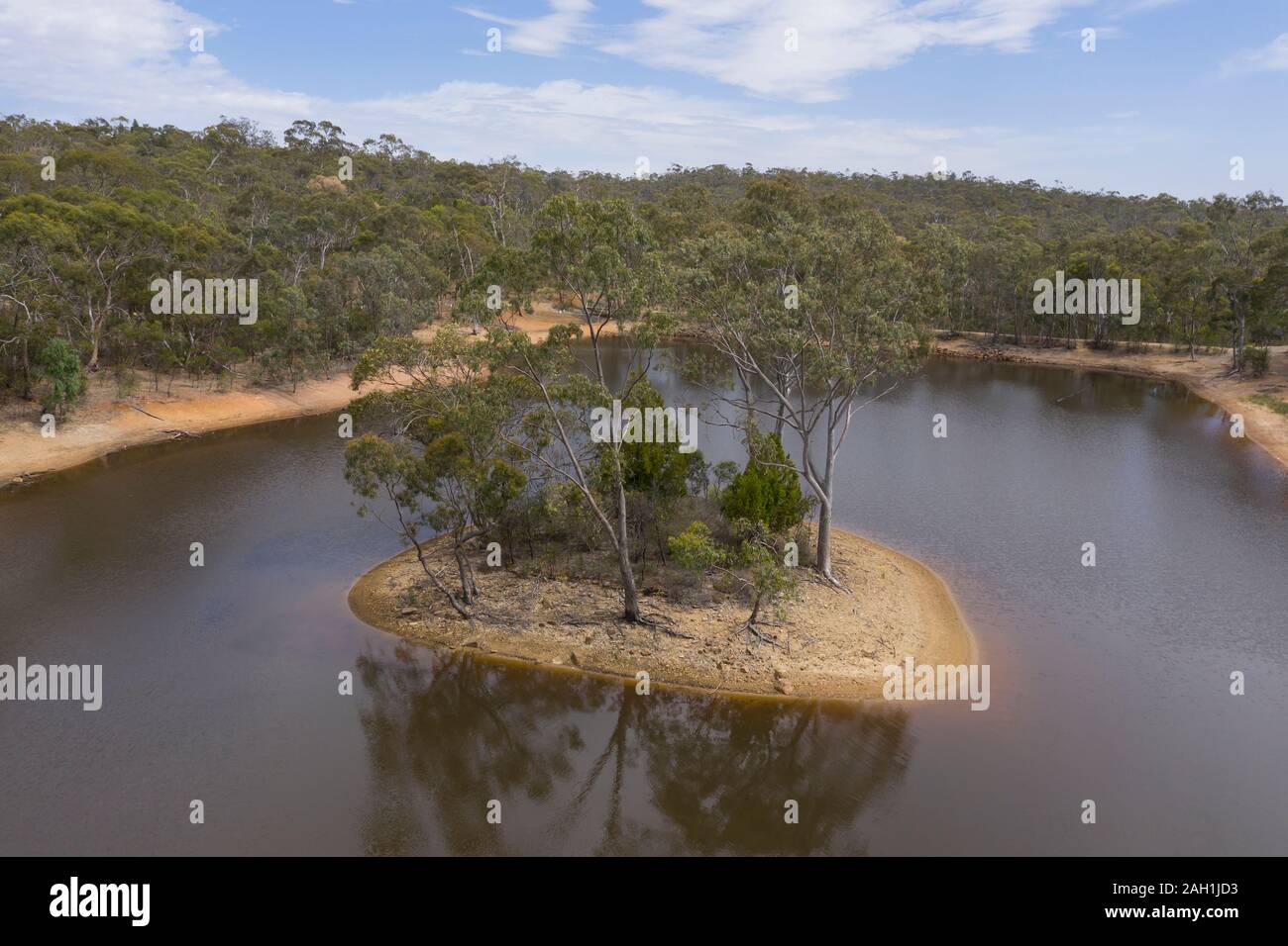Aerial photograph of a drought affected water reservoir and mini island ...