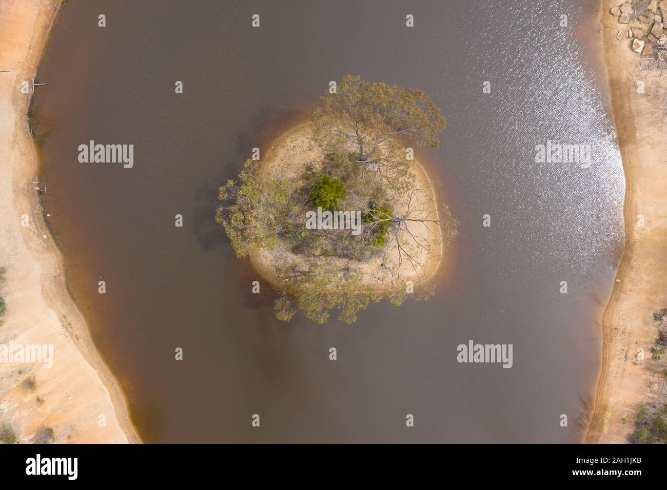Aerial photograph of mini island in a drought affected water reservoir ...