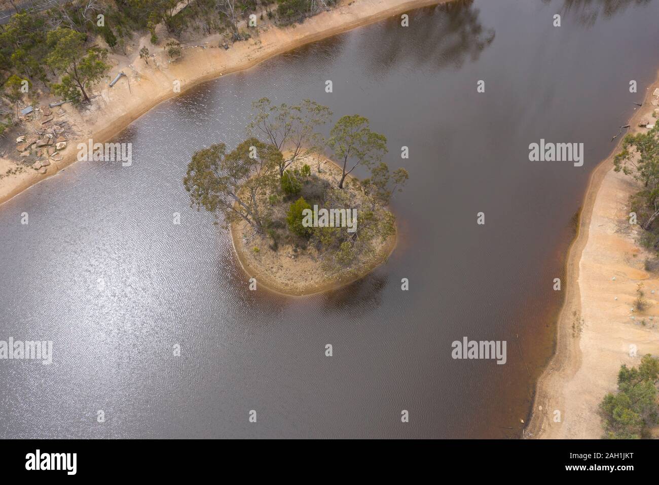 Aerial photograph of mini island in a drought affected water reservoir ...