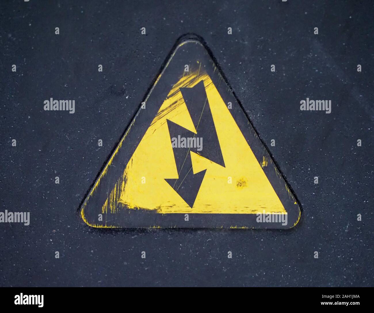 Electrocution risk by high voltage warning sign Stock Photo - Alamy