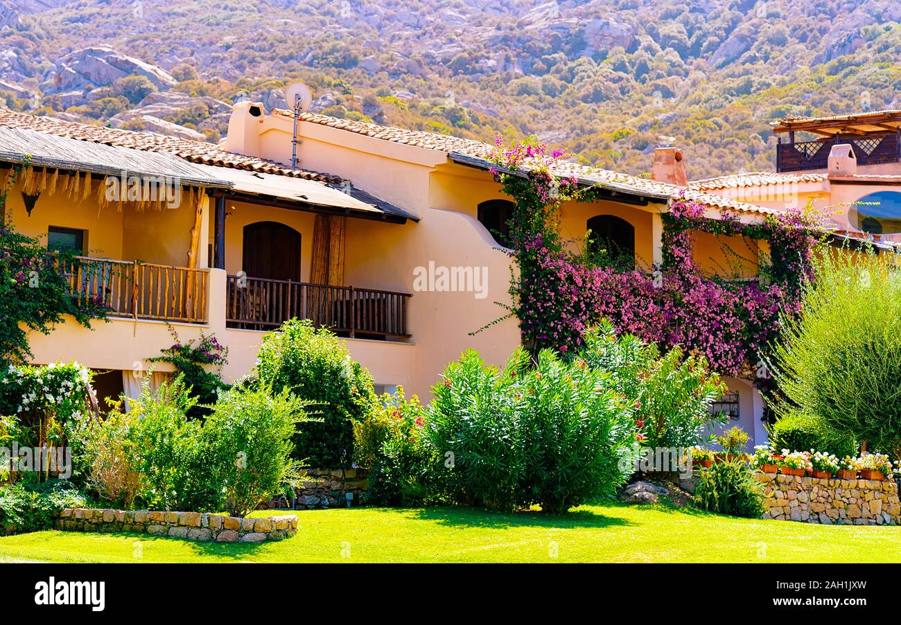 Windows and balconies of residential house complex in Porto Cervo ...