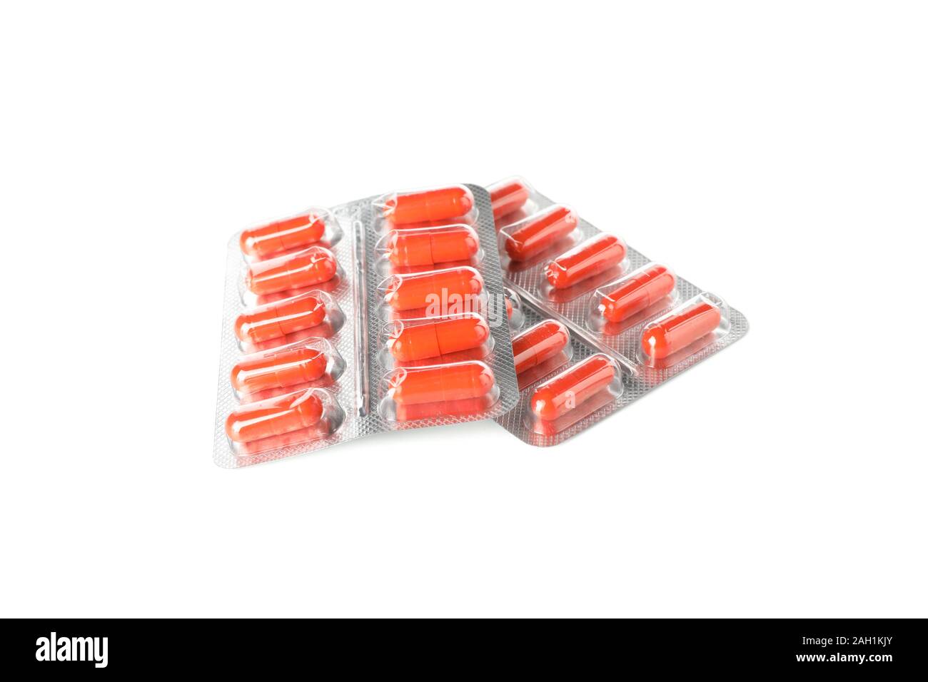 Orange capsules pill in blister pack isolated on white background Stock ...