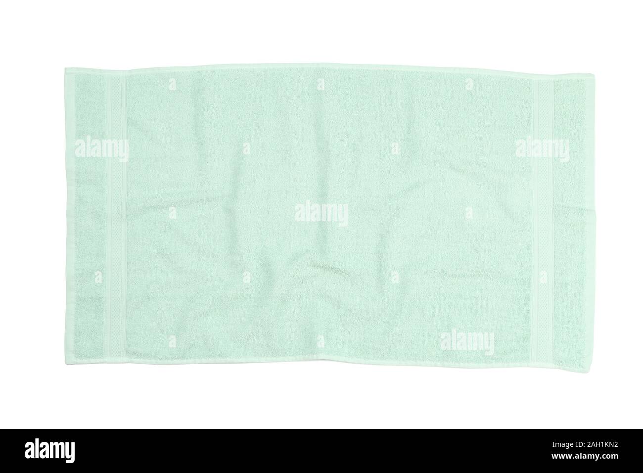 Crumpled green towel isolated on white background Stock Photo - Alamy