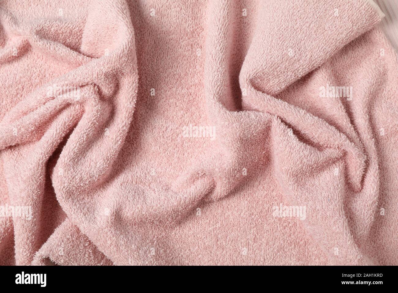 Pink crumpled towel textured background, close up Stock Photo - Alamy