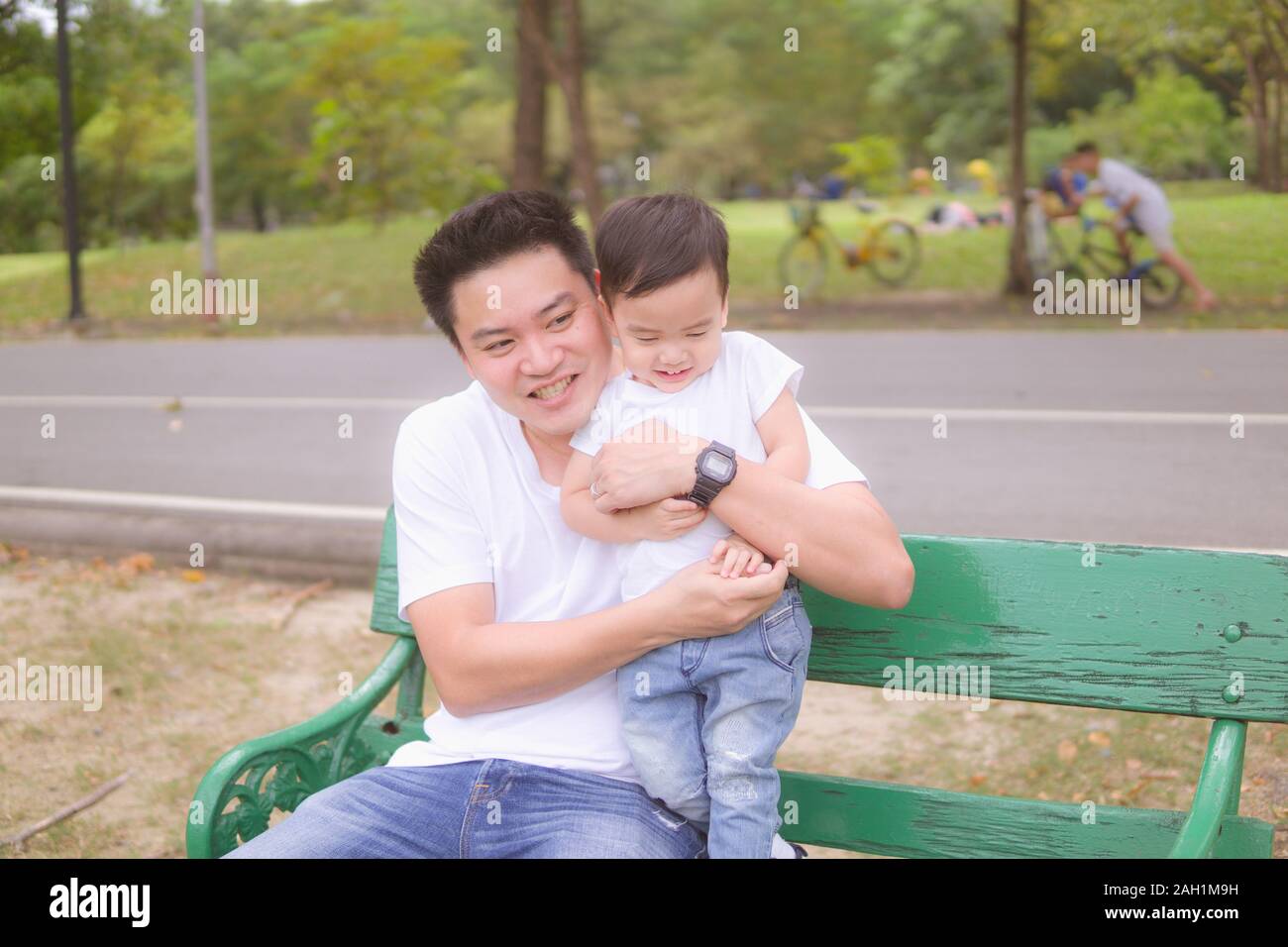 Lifestyle portrait Father and son in happines at the outside in the ...