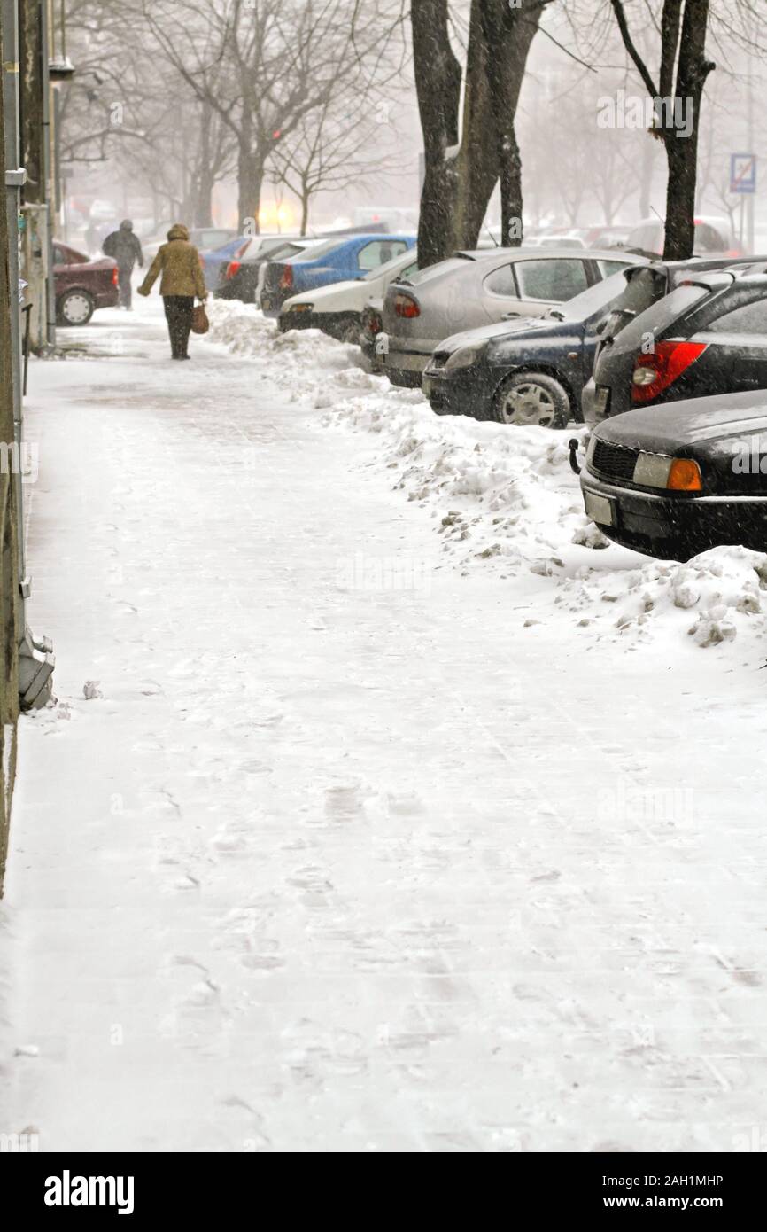 Pedestrian Walk in Winter Snow Blizzard Weather Stock Photo - Alamy