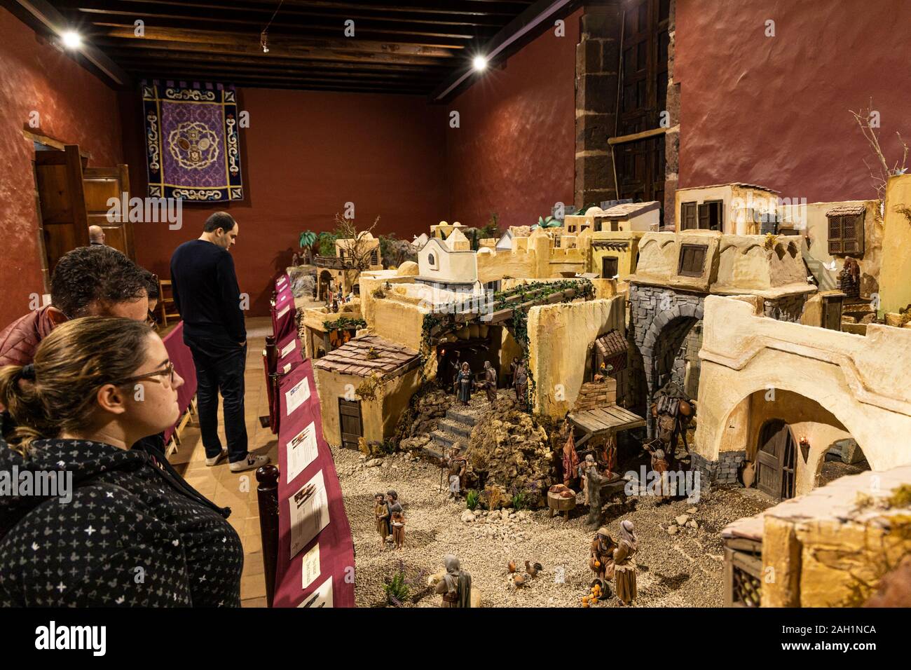 Nativity scene showing the village of Bethlehem with details from the ...