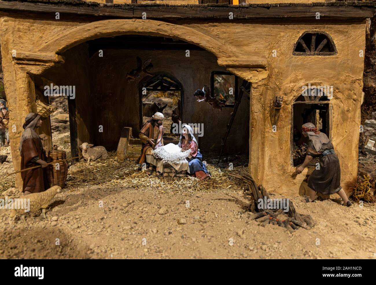 Nativity scene showing the village of Bethlehem with details from the ...