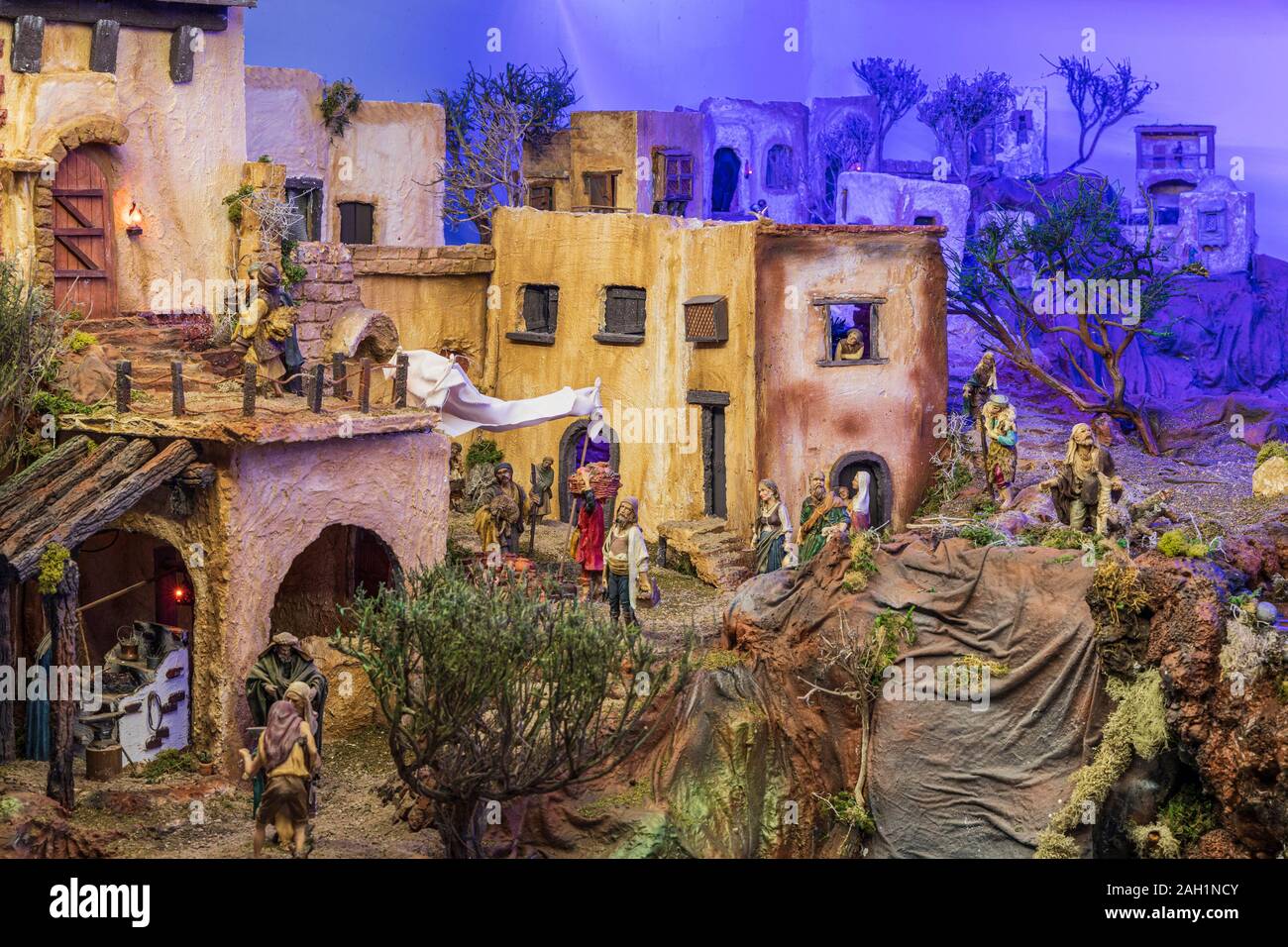 Nativity scene showing the village of Bethlehem with details from the ...