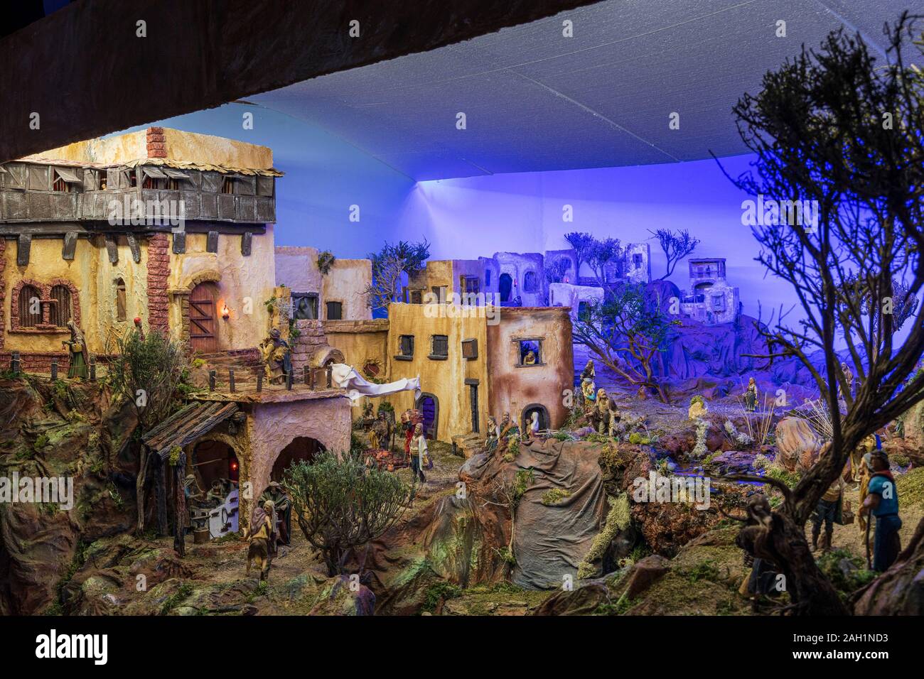 Nativity scene showing the village of Bethlehem with details from the ...