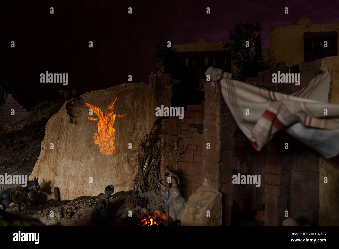 Nativity scene showing the village of Bethlehem with details from the ...