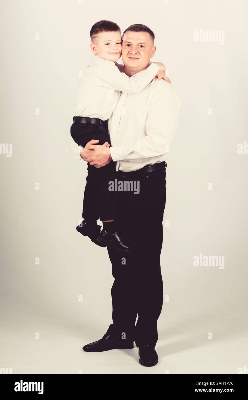 tuxedo style. Wedding party. happy child with father. business meeting ...