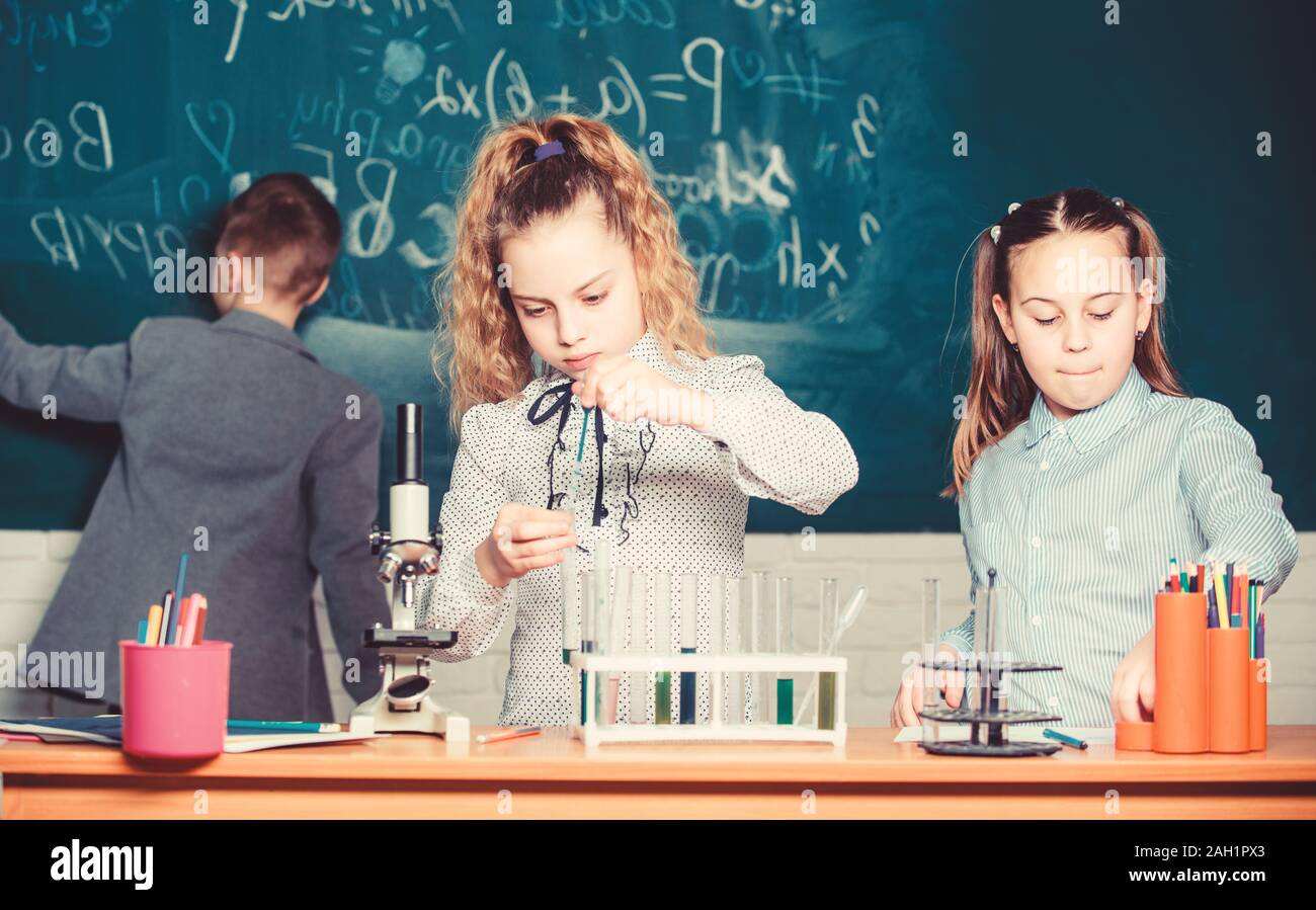 School girls study. Explore biological molecules. Future technology and ...