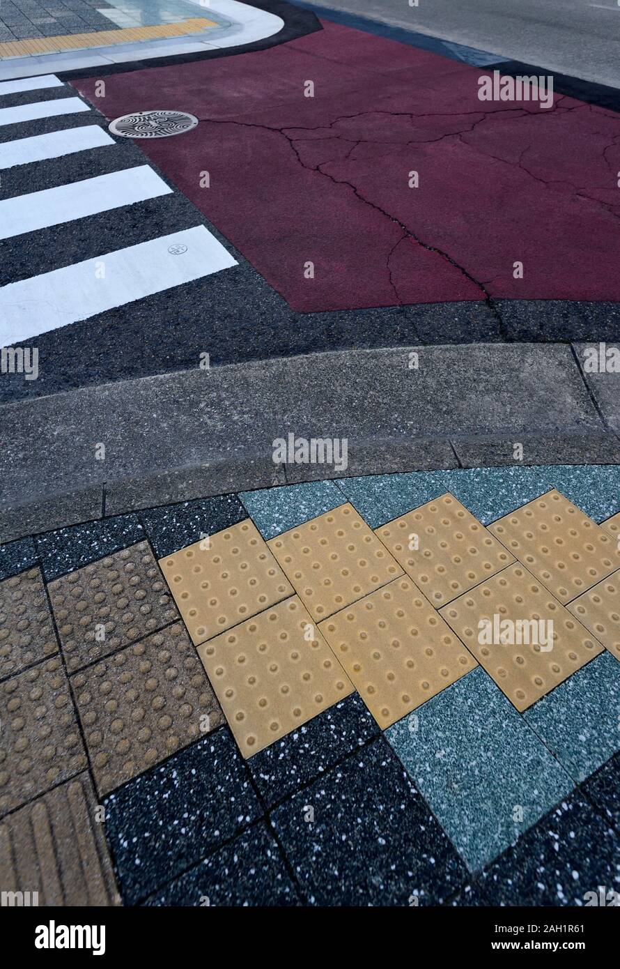 Braille studs in pavement Japan Stock Photo - Alamy