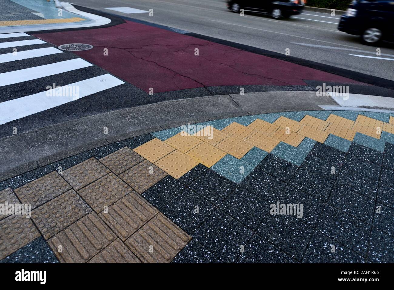 Braille studs in pavement Japan Stock Photo - Alamy