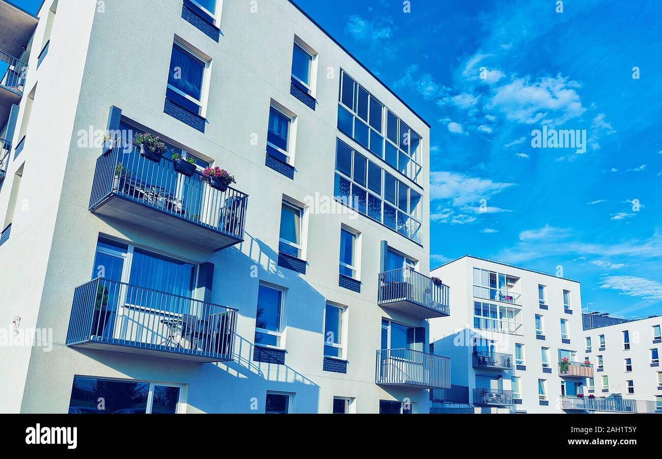 New block of residential buildings with reflex Stock Photo - Alamy