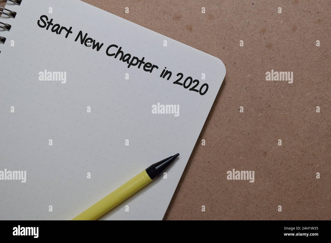 Start New Chapter in 2020 write on a book isolated on Office Desk Stock ...