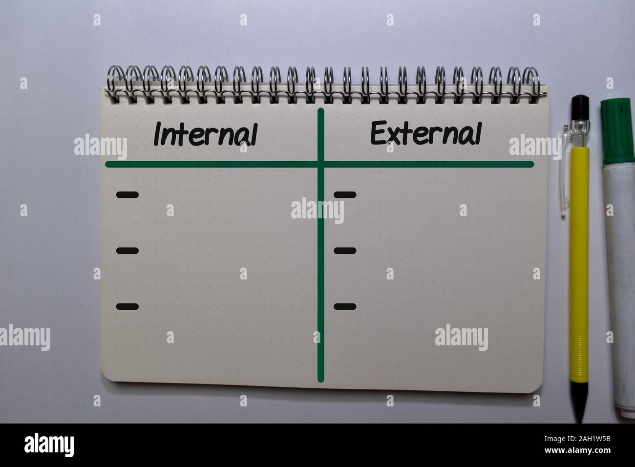 Internal or External write on a book isolated on Office Desk Stock ...
