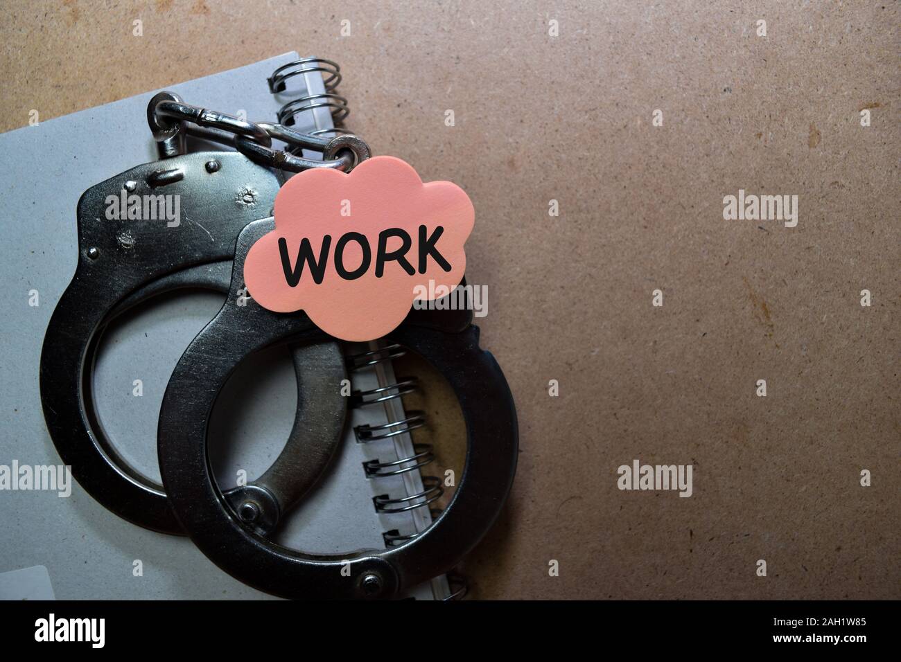 Work write on sticky note and Handcuffs isolated on Office Desk Stock ...