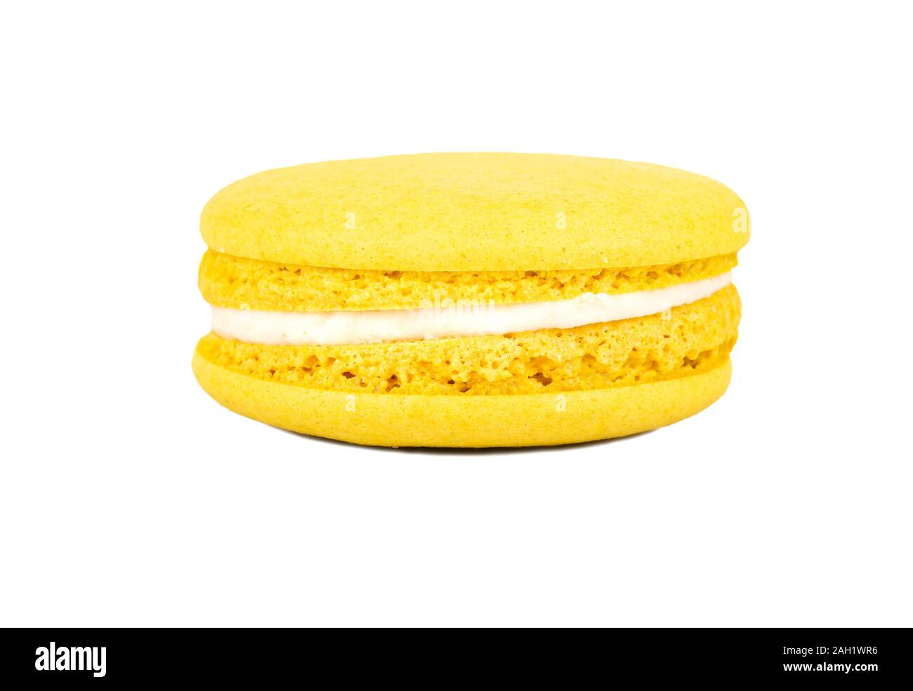 Yellow lemon macaroon isolated on white background Stock Photo - Alamy
