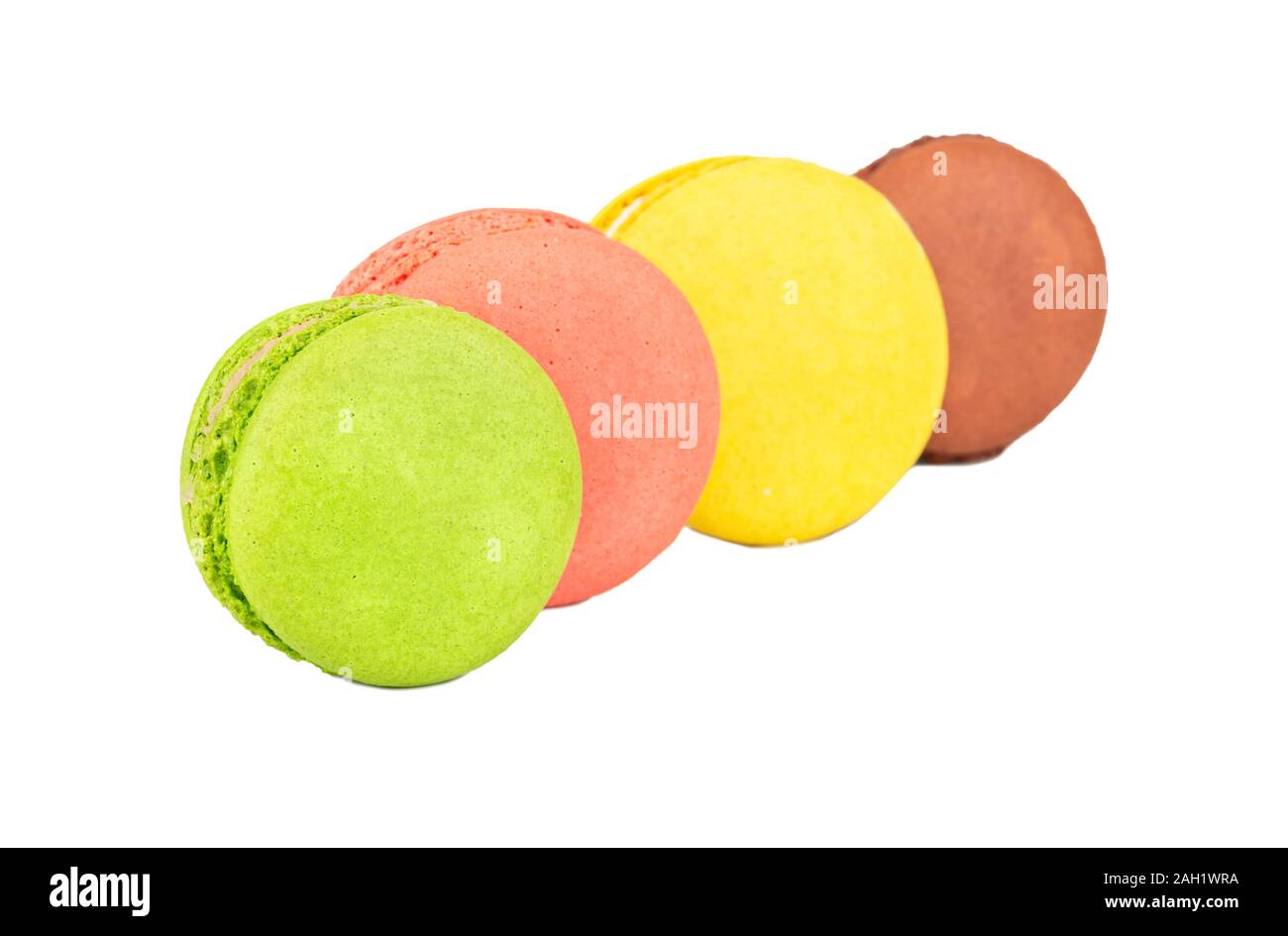 Delicious four colored macaroons on a white background Stock Photo - Alamy