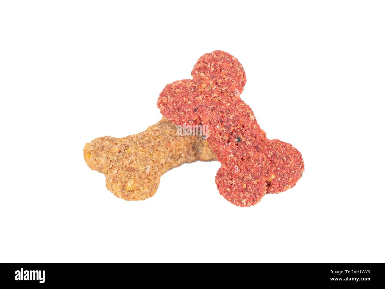 Dry dog food in the shape of a bone on a white background Stock Photo ...