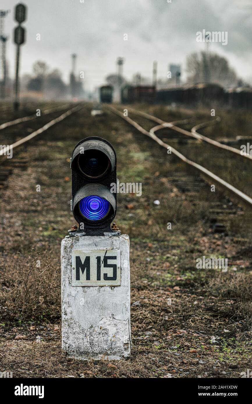 Railway traffic light with a blue standard signal. Semaphore on ...