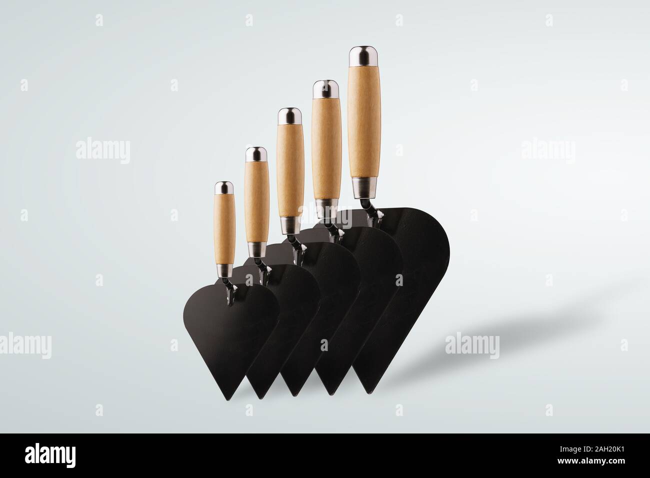 set of construction spatulas over gray background Stock Photo - Alamy