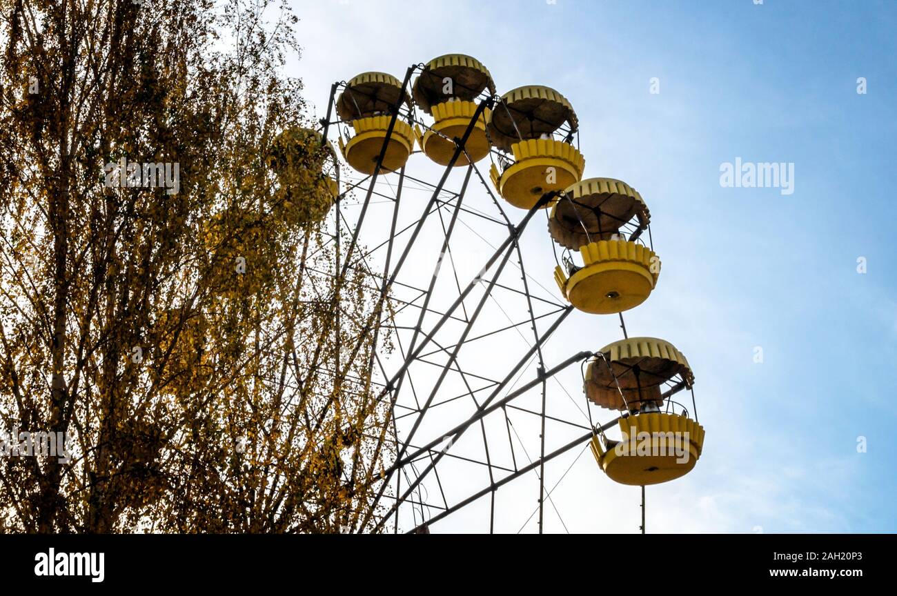 fragment old carousel wheel in an abandoned amusement park in Chernobyl ...