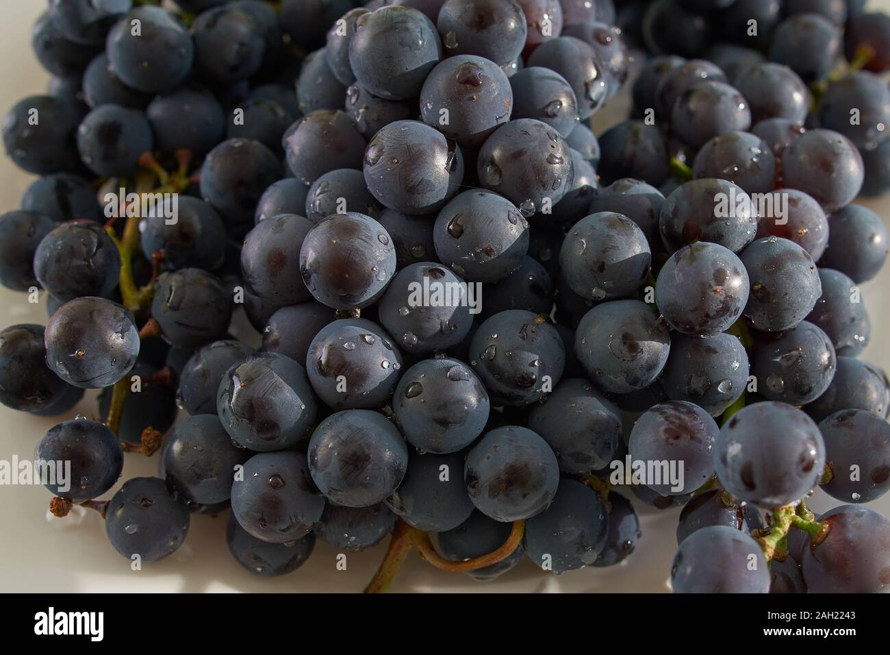Ripe grapes as a background Stock Photo - Alamy