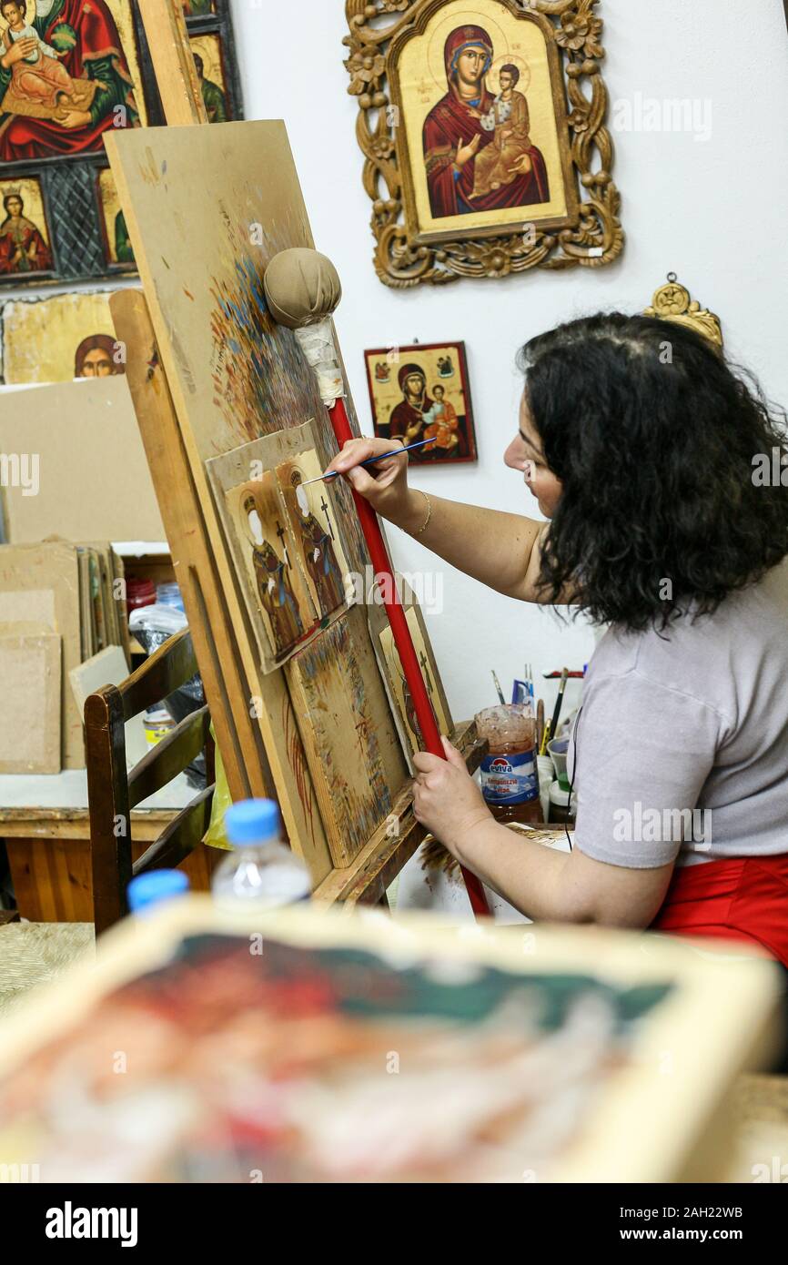Kalabaka, Greece -may 18th, 2011: Artist paiting icons in icon painting ...