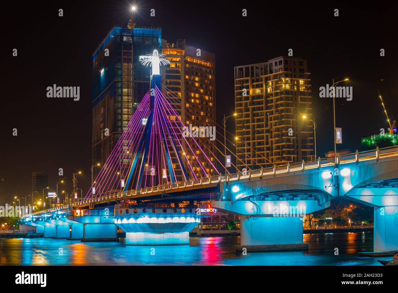 Han River Bridge illuminated at night over The Han River. Da Nang ...