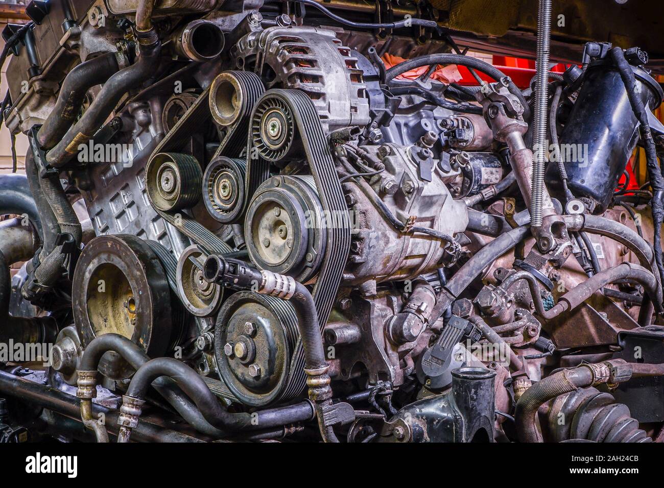 a modern used fossil fuel engine removed from the car Stock Photo - Alamy