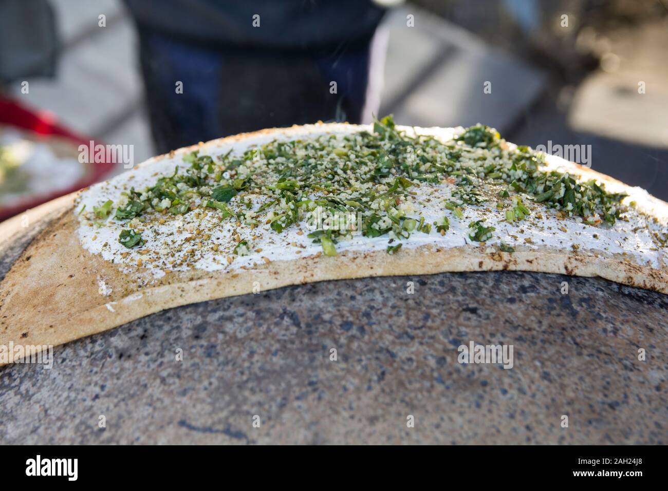 Traditional Druze Pita bread, baked on a metal Saj or Tava, with ...