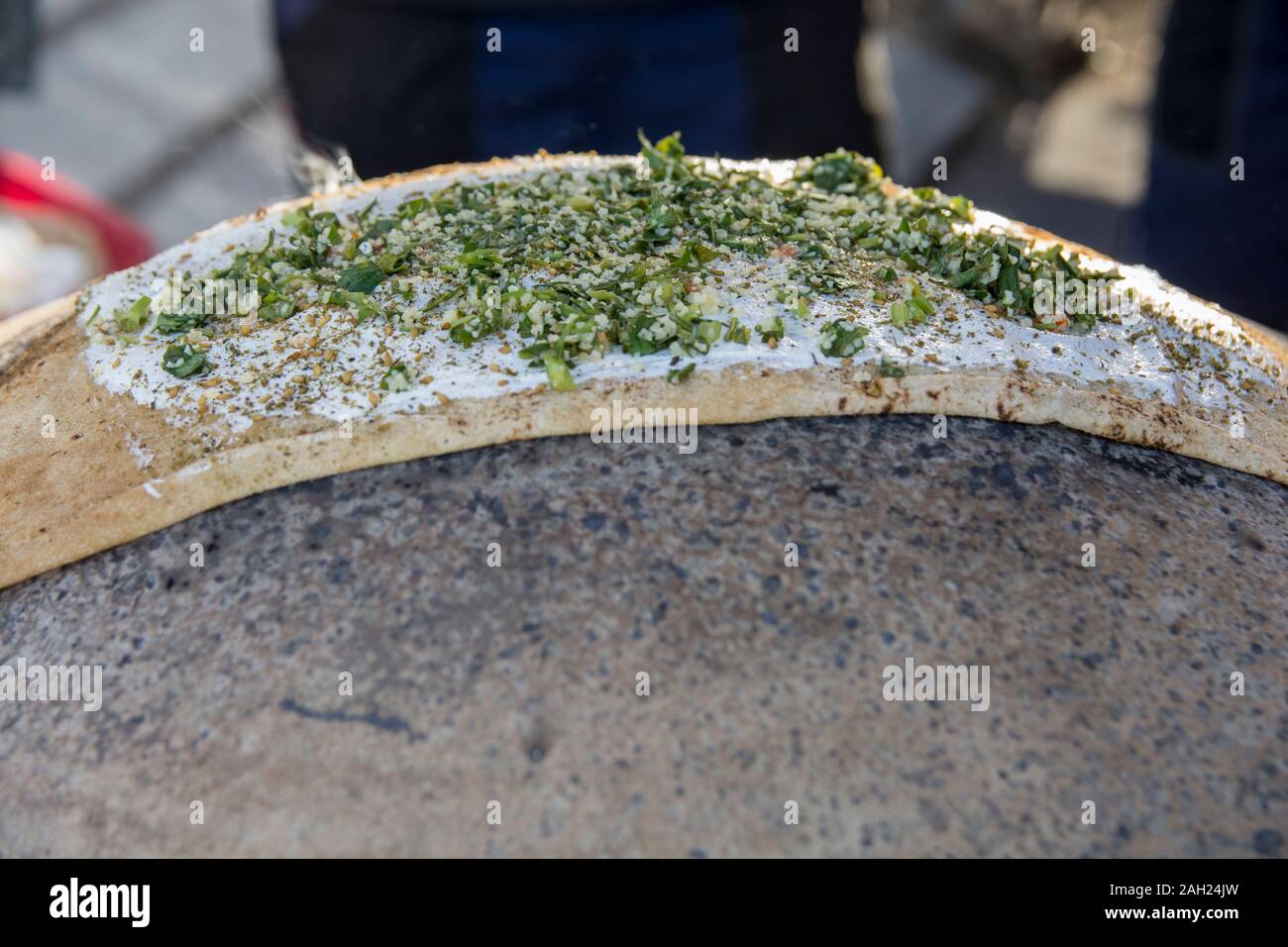 Traditional Druze Pita bread, baked on a metal Saj or Tava, with ...