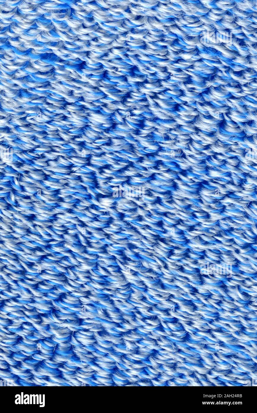 detail of the woven cover on a damper roller for an offset printing ...