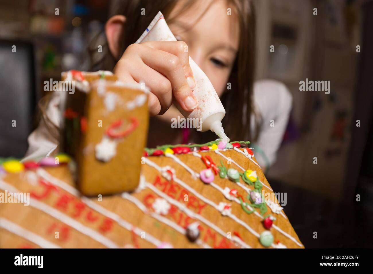 Little Girl Building her Very First Gingerbread House Stock Photo - Alamy