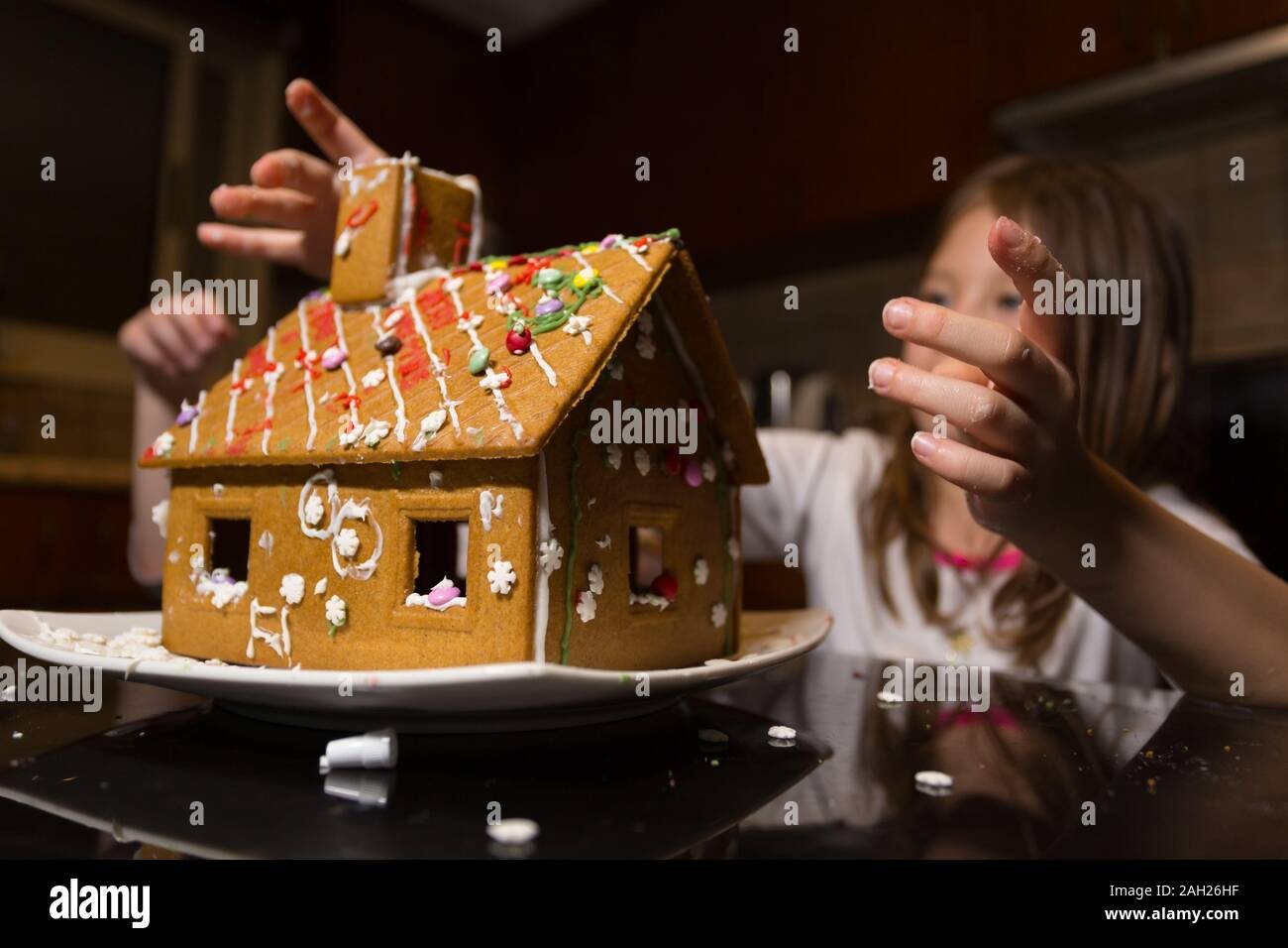 Children Building Their Very First Gingerbread House Stock Photo - Alamy