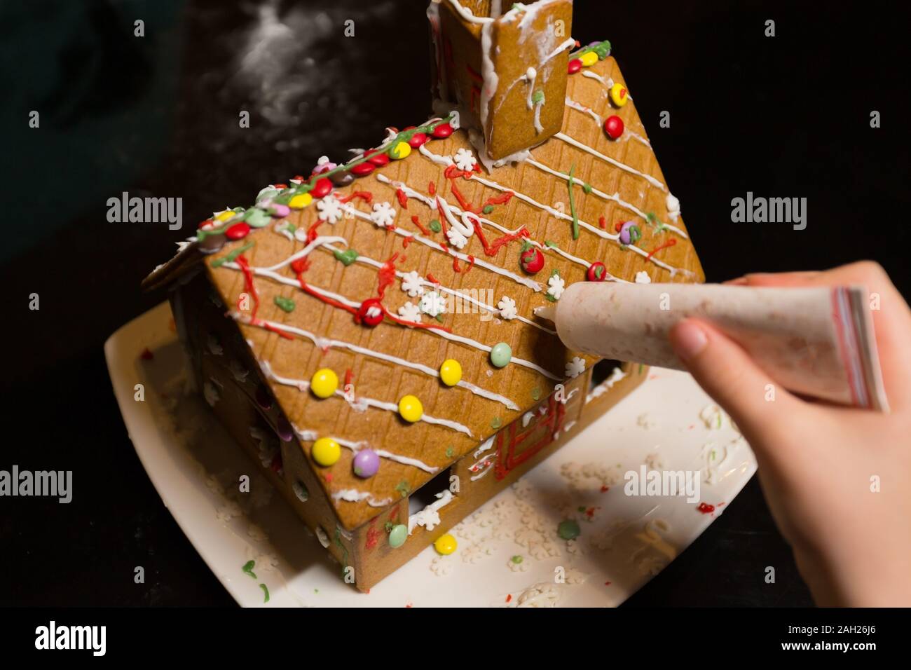 Children Building Their Very First Gingerbread House Stock Photo - Alamy